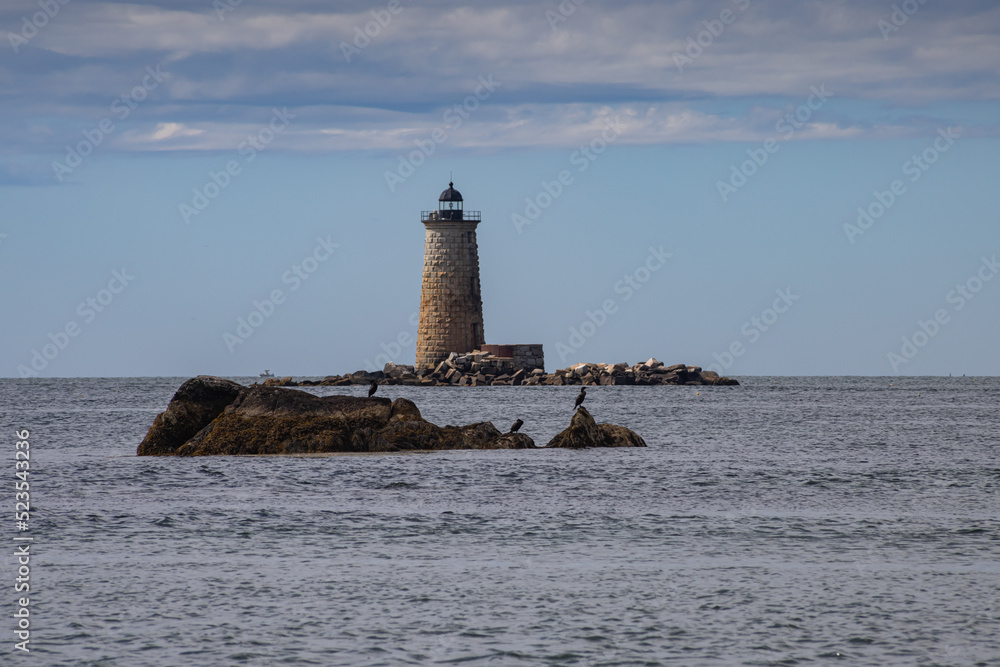 Moody Lighthouse Landscape Under Dramatic Clouds With Double-Crested ...
