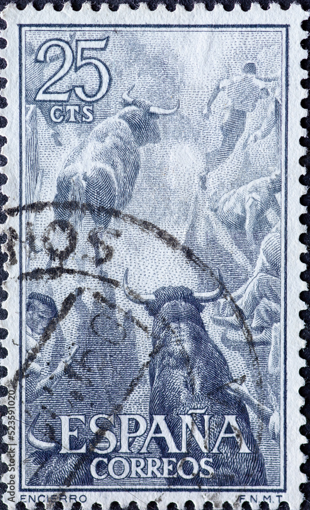 Spain - CIRCA 1960: a postage stamp from Spain, showing a bull in the ...