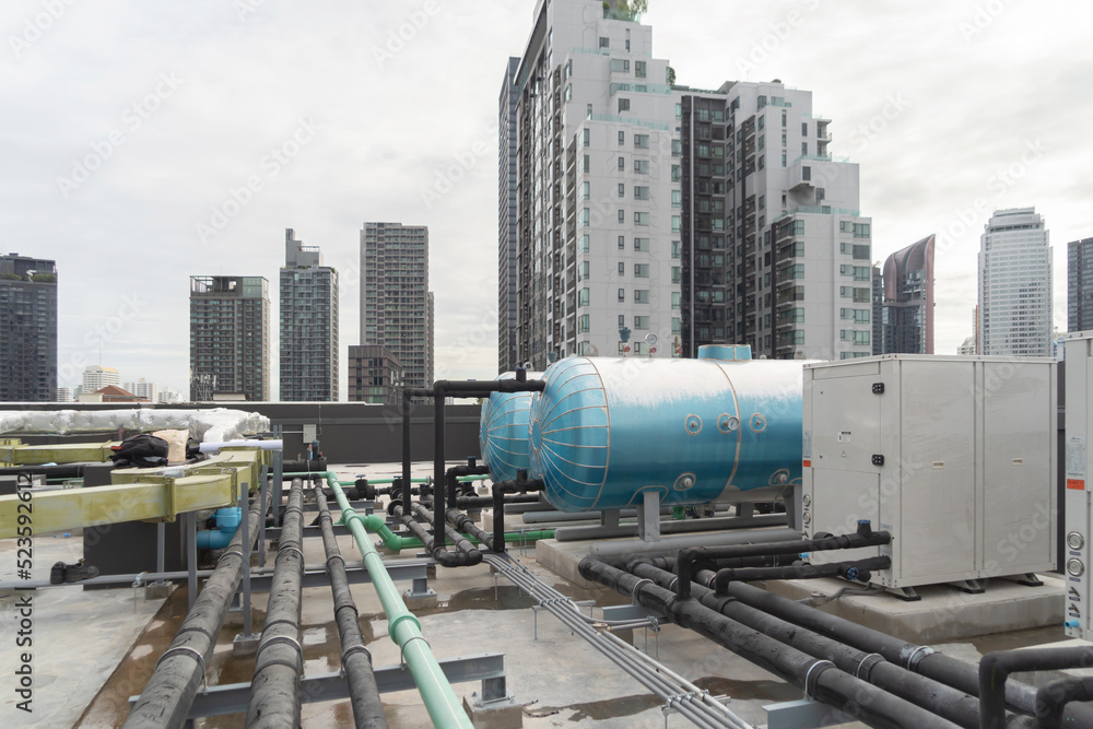 Chiller tower or cooling tower on rooftop of a office building in urban ...