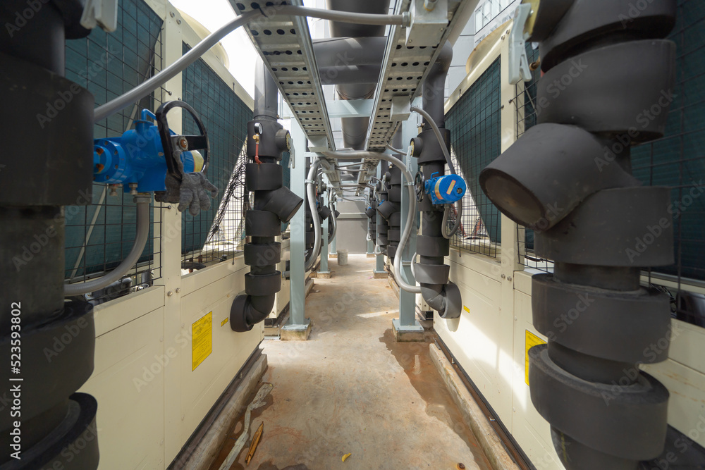 Chiller tower or cooling tower on rooftop of a office building in urban ...