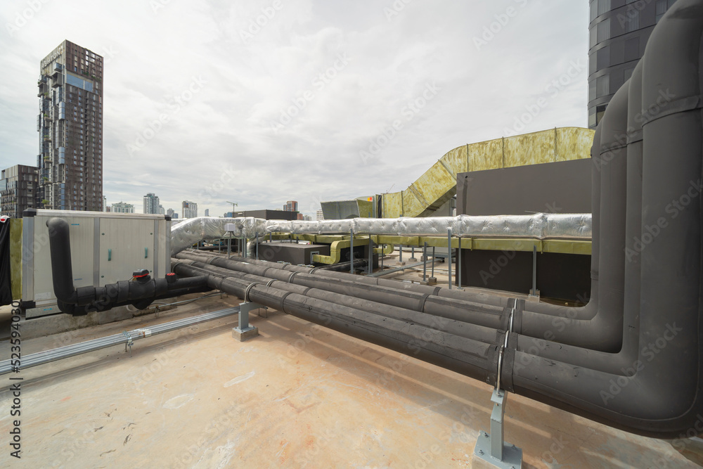 Chiller tower or cooling tower on rooftop of a office building in urban ...