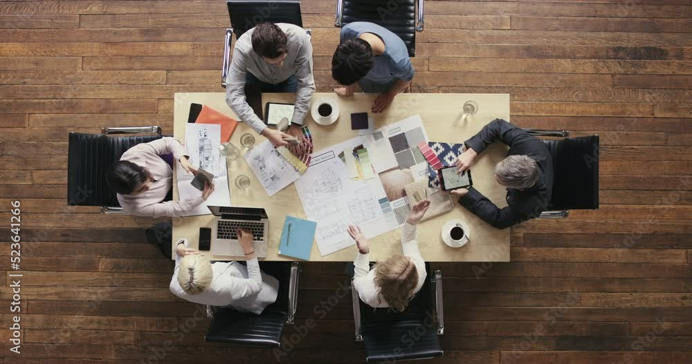 Time lapse of interior design team discussing, talking and planning ...