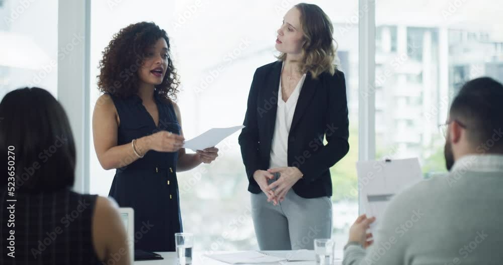 Talking female leaders presenting paperwork, innovation strategy plan ...