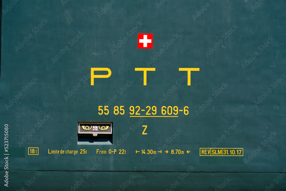 Dark green railway wagon of former Swiss Post company PTT with letter ...
