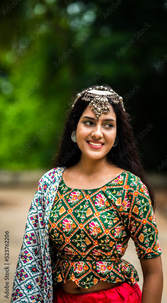 Beautiful Indian woman in traditional chaniya choli for navratri ...