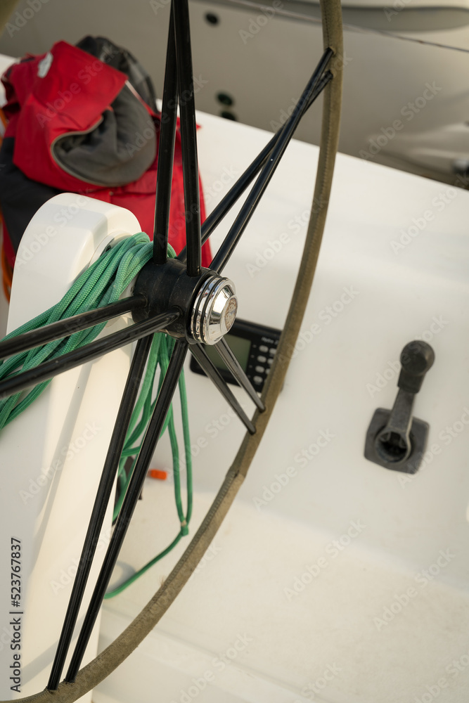 Control wheel of sailing yacht, close up. Stock Photo | Adobe Stock