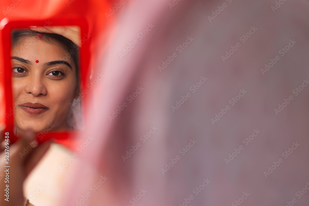 Reflection of a woman face on hand mirror Stock Photo | Adobe Stock