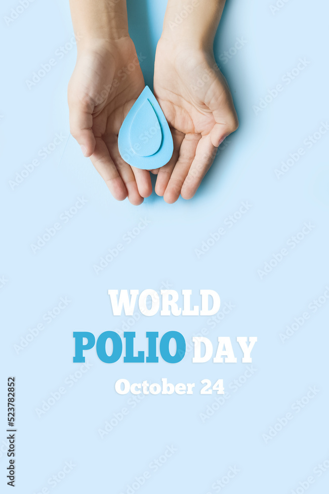 World Polio day. October 24. A blue drop in the hands of a child is a ...