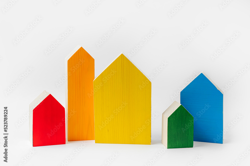 Colorful wooden toys. Houses in the colors of the rainbow. Cute kids ...
