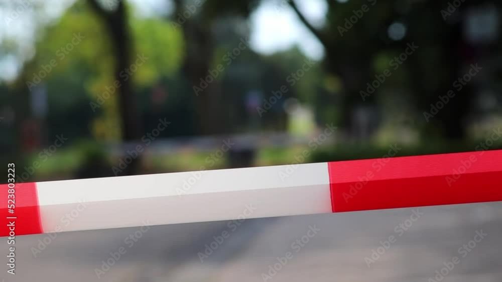 Red white barrier tape in pandemic lockdown marks crime scene ...