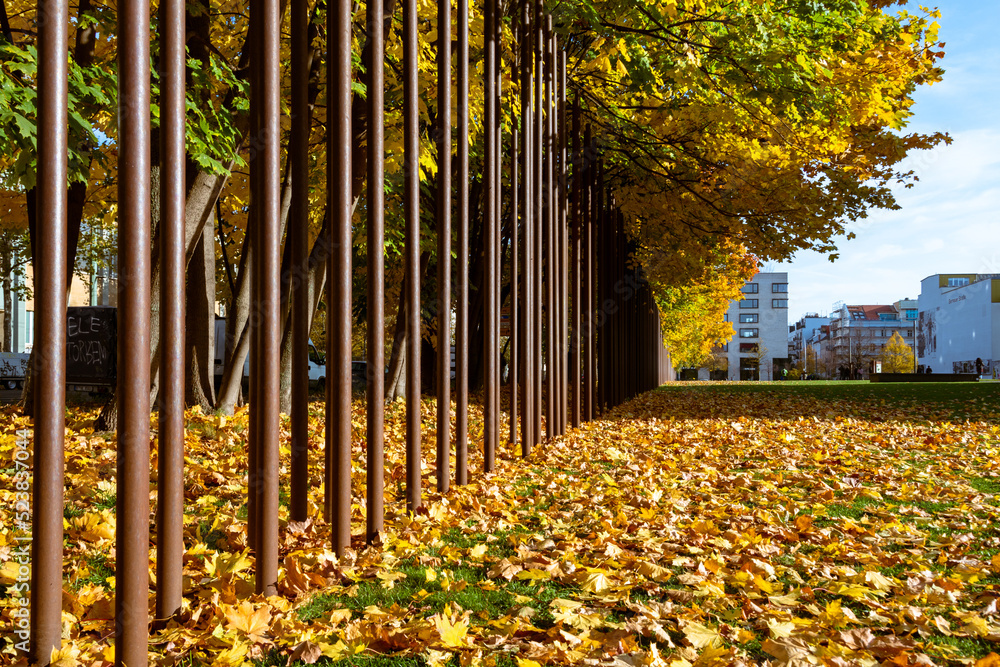 Autumn in Berlin, Germany. Yellow and orange leaves surround famous ...