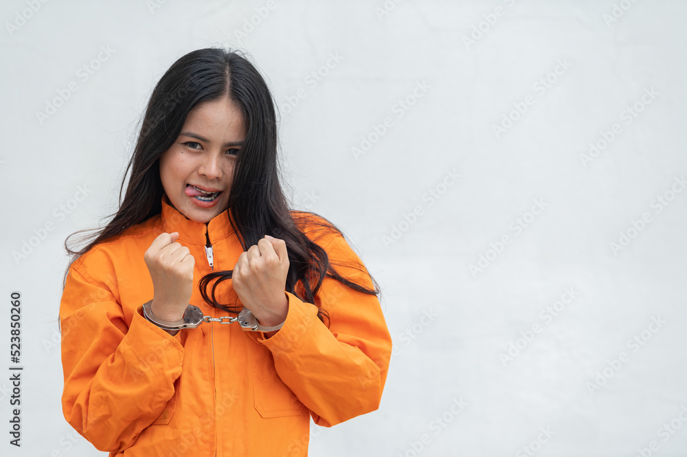 Prisoner in orange robe concept,Portrait of asian woman in Prison ...