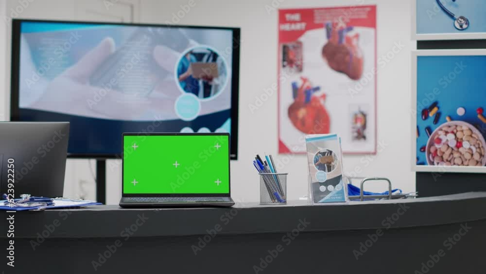 Video Stock Empty reception desk with greenscreen on laptop display ...