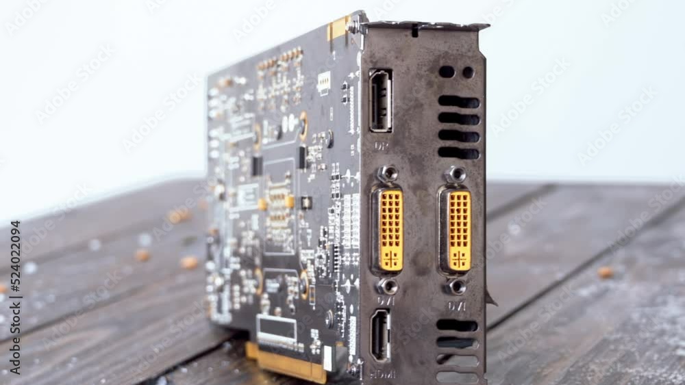 Close up rotation of graphical card accelerator micro scheme with chips ...