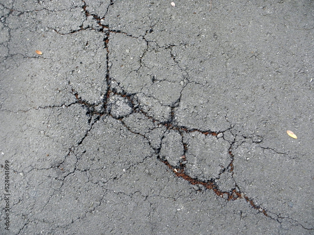 Asphalt pavement cracks. Cement pavement cracks Stock Photo | Adobe Stock