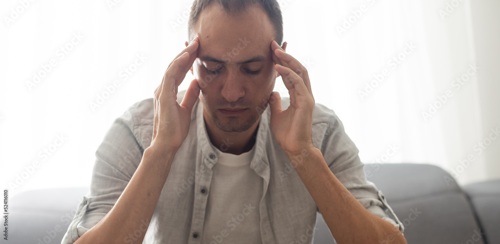 Exhausted Caucasian millennial male worker take off glasses massage ...