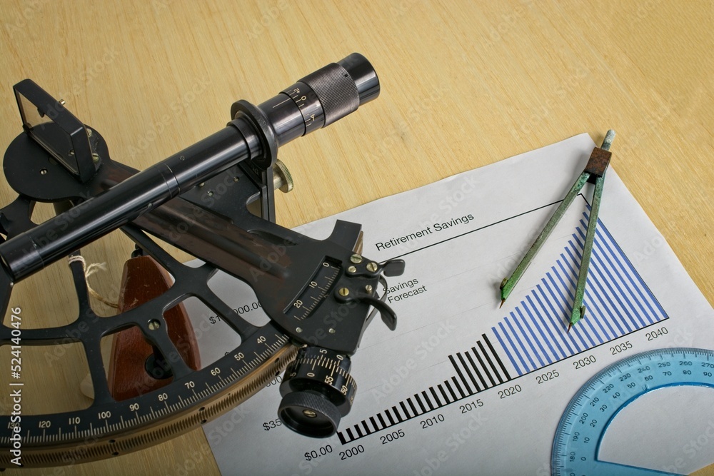 Navigating retirement concept with nautical theme of sextant protractor ...