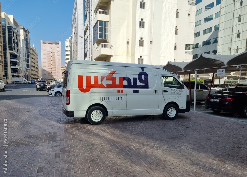 FedEx express Toyota hiace van delivering in streets of Dubai, FedEx is ...