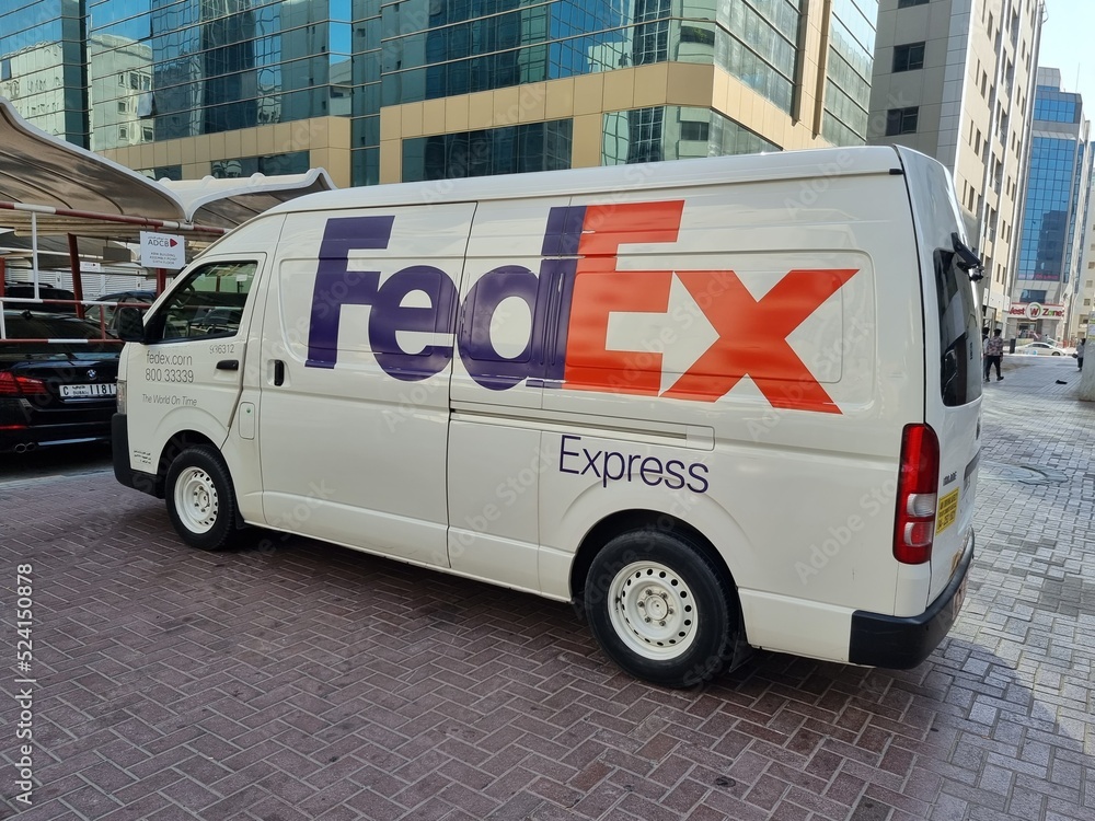 FedEx express Toyota hiace van delivering in streets of Dubai, FedEx is ...