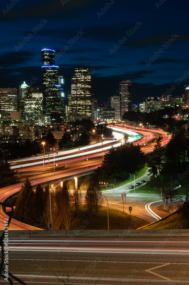 Portrait long exposure shot of evening traffic at Interstate 5 in front ...