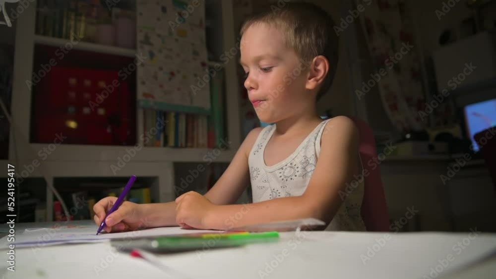 Young excited boy drawing with crayons. 4k real time 30fps video ...
