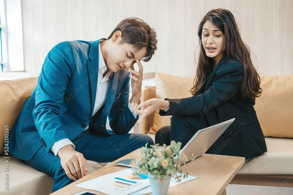 Angry asian businesswoman arguing with businessman about work failure ...