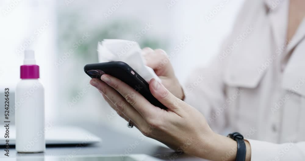 Hygiene, sanitizing and disinfecting during covid by cleaning a phone ...