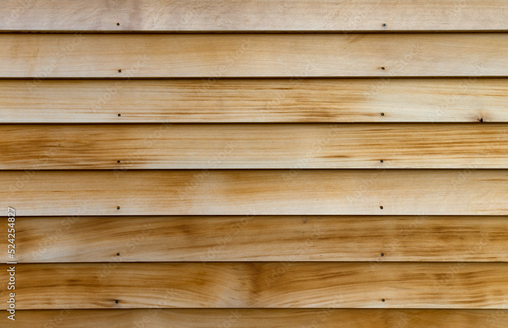 Horizontal rows of cedar wood siding as an exterior wall Stock Photo ...