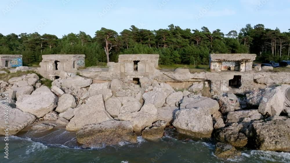 Ruins of bunkers on the beach of the Baltic sea, part of an old fort in ...