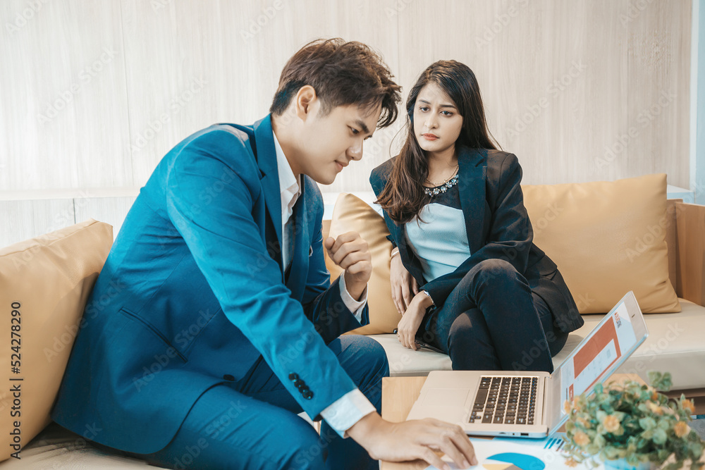 Angry asian businesswoman arguing with businessman about work failure ...