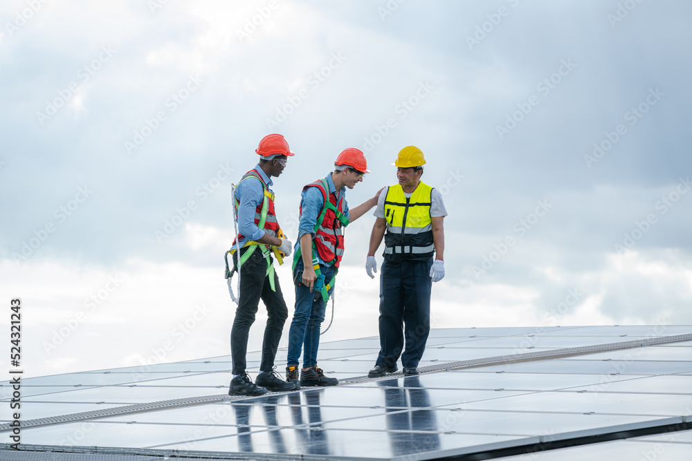 Technician wearing safety harness belt during installing the solar ...
