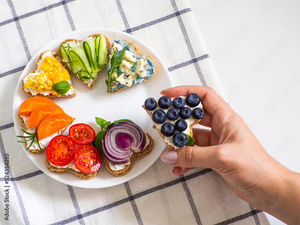 Rainbow sandwiches heart shape. Breakfast bread rainbow sandwiches with ...