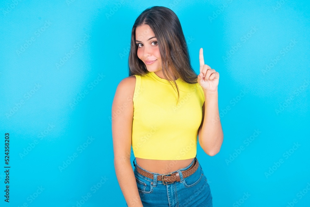 No sign gesture. Closeup portrait unhappy brunette woman wearing yellow ...