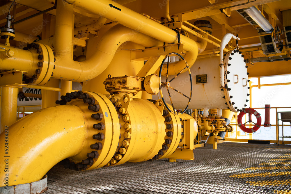 Oil and gas processing plant with pipe line valves.Steel pipelines and ...