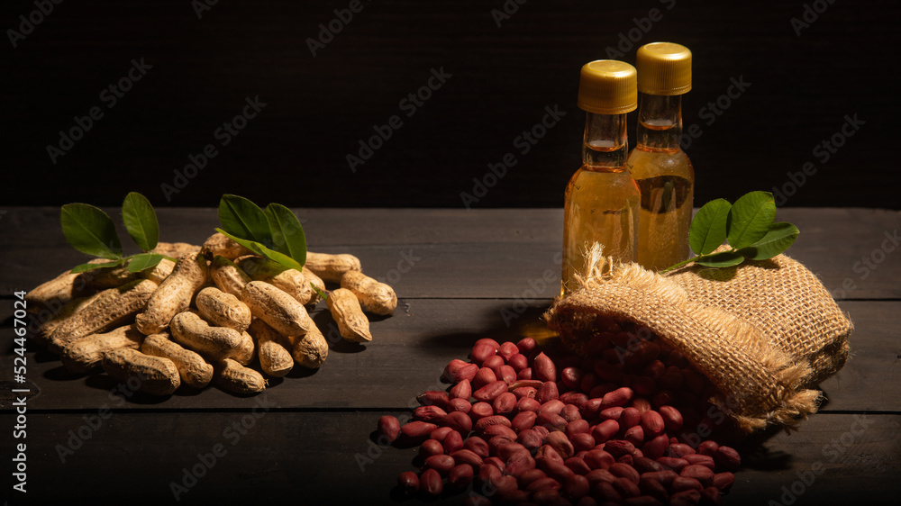 peanut oil, small bottles with peanuts in shell and in organic grains ...