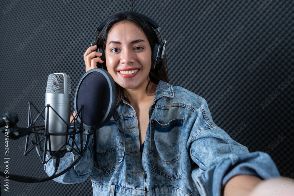 Happy cheerful pretty smiling of portrait young Asian woman vocalist ...