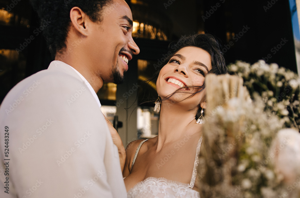 Stylish stunning couple together on their wedding day against the ...