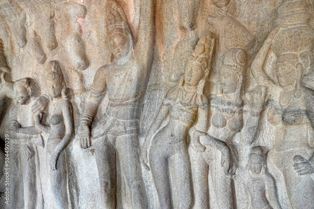 Human rock relief sculptures carved in the rock cut ancient cave temple ...