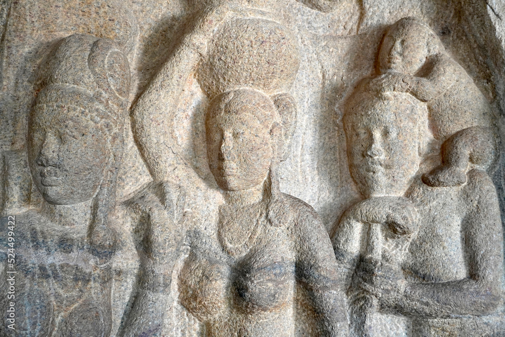 Human rock relief sculptures carved in the rock cut ancient cave temple ...
