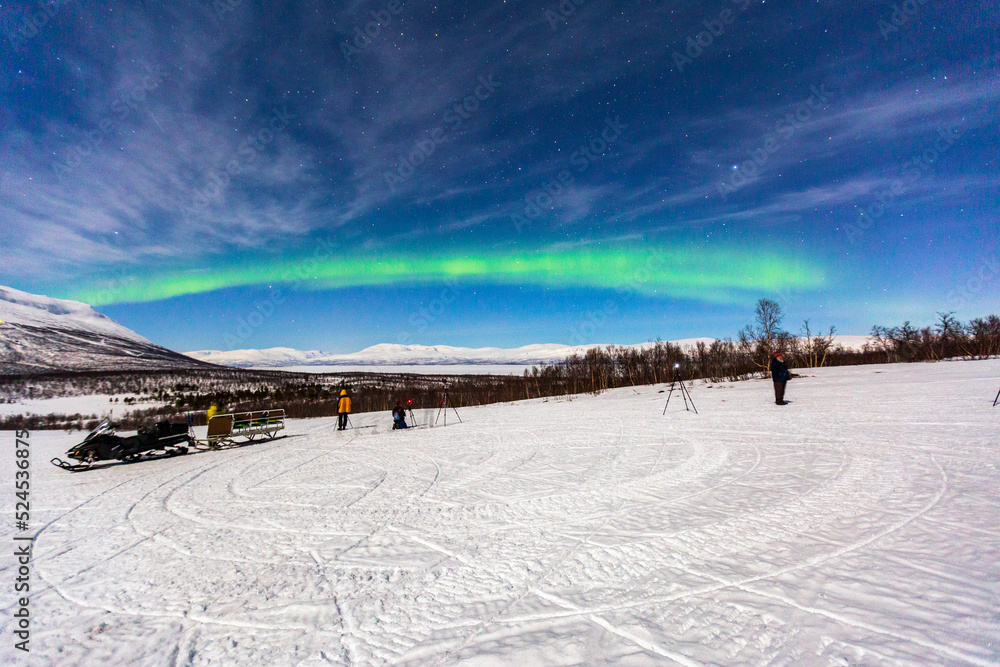 Aurora boreale in Lapponia ad Abisko.Luci nel cielo nella fredda notte ...