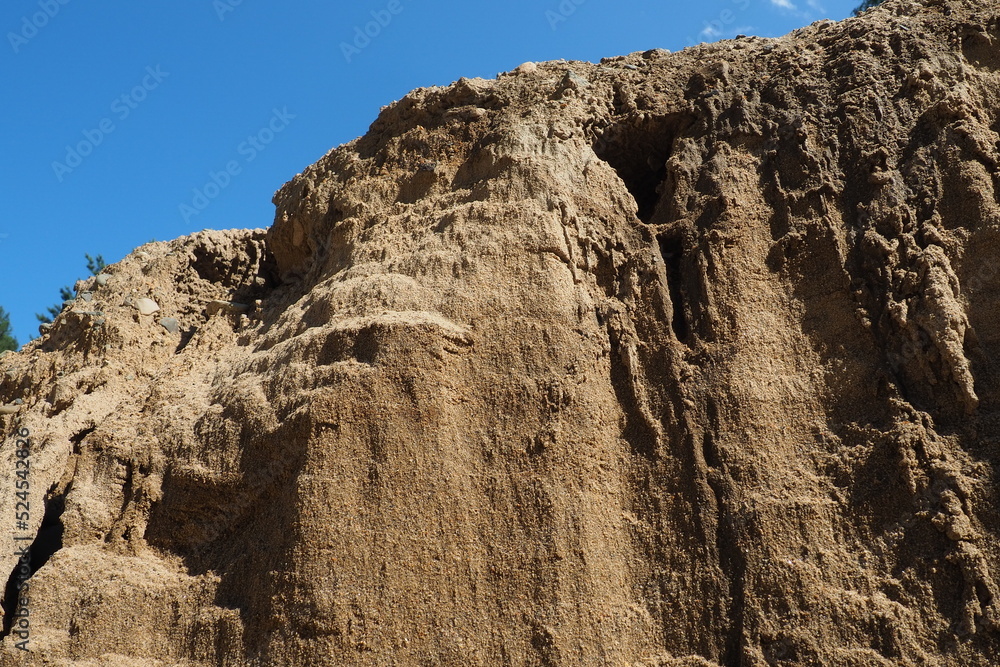 Sandstone is a fragmentary sedimentary rock, a homogeneous or layered ...