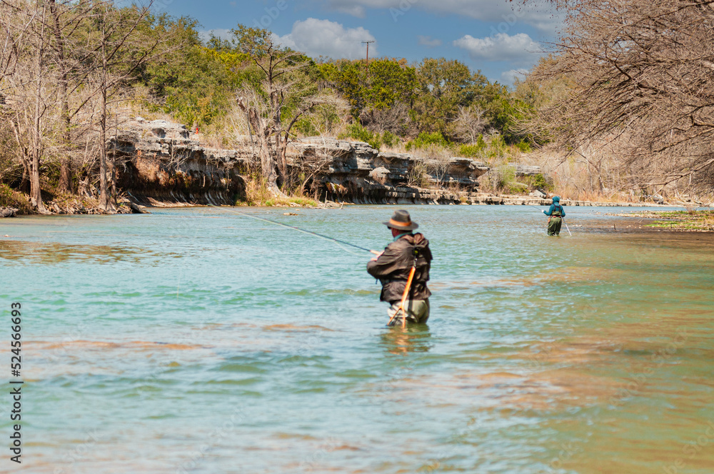Two anglers fly fishing for trout in the Guadalupe River 5 miles below ...