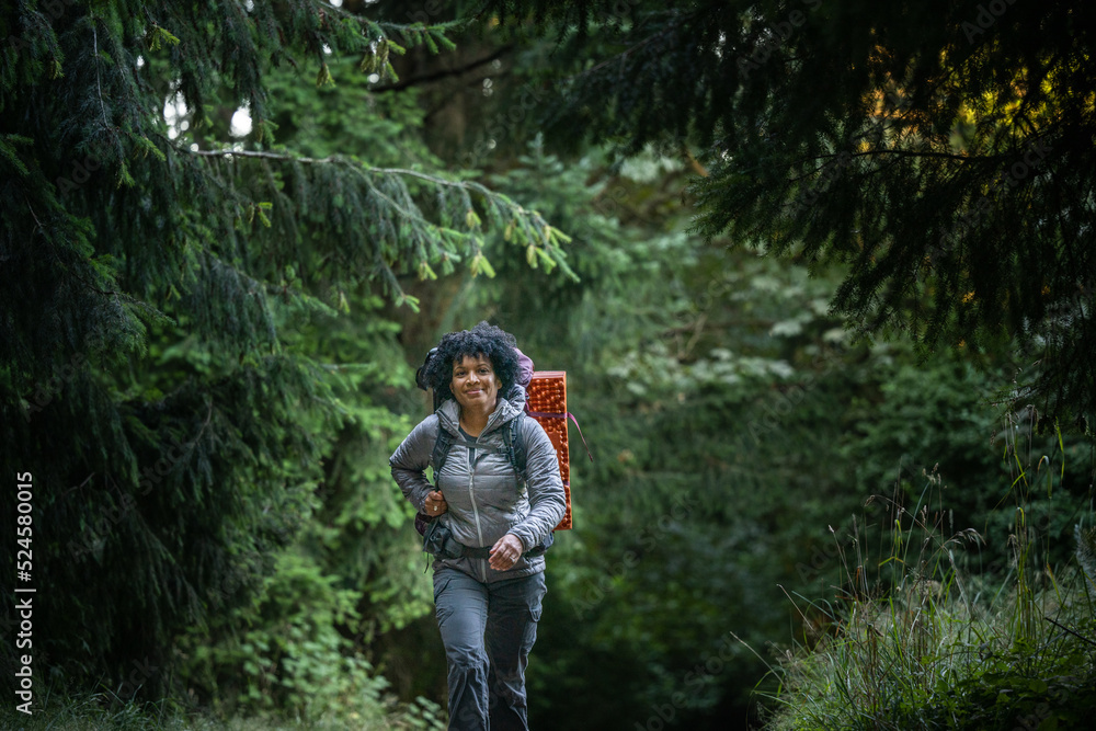 U.S. Army female soldier putting in the miles with an early morning ...
