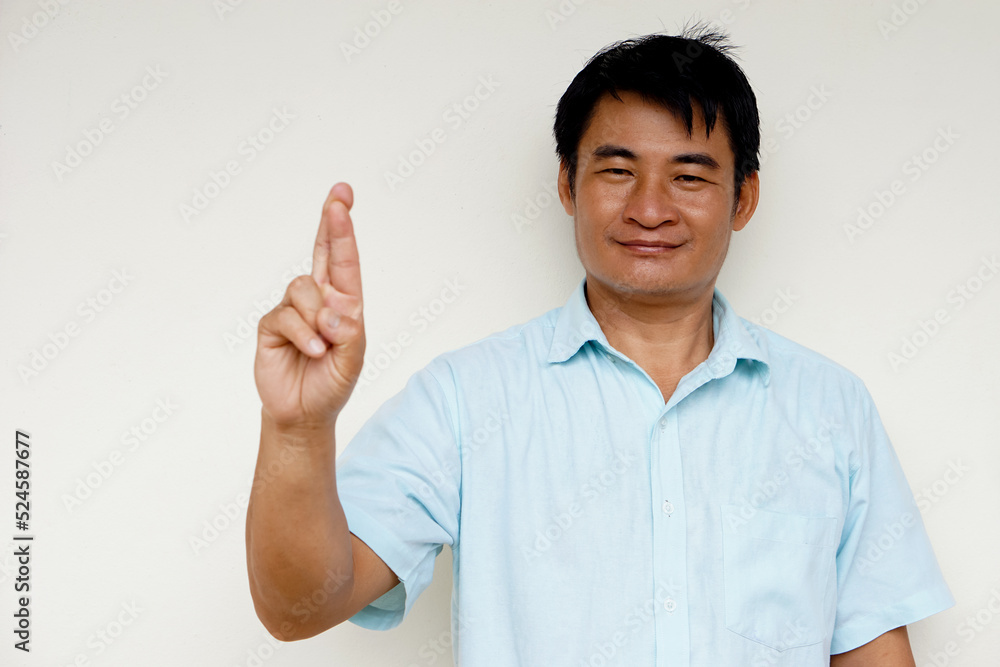 Asian man teacher shows body sign language on white background. fingers ...