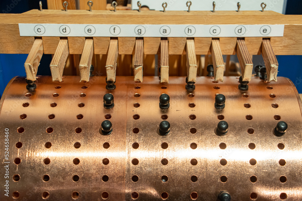 The mechanism of the barrel organ with a programmable nailed cylinder ...