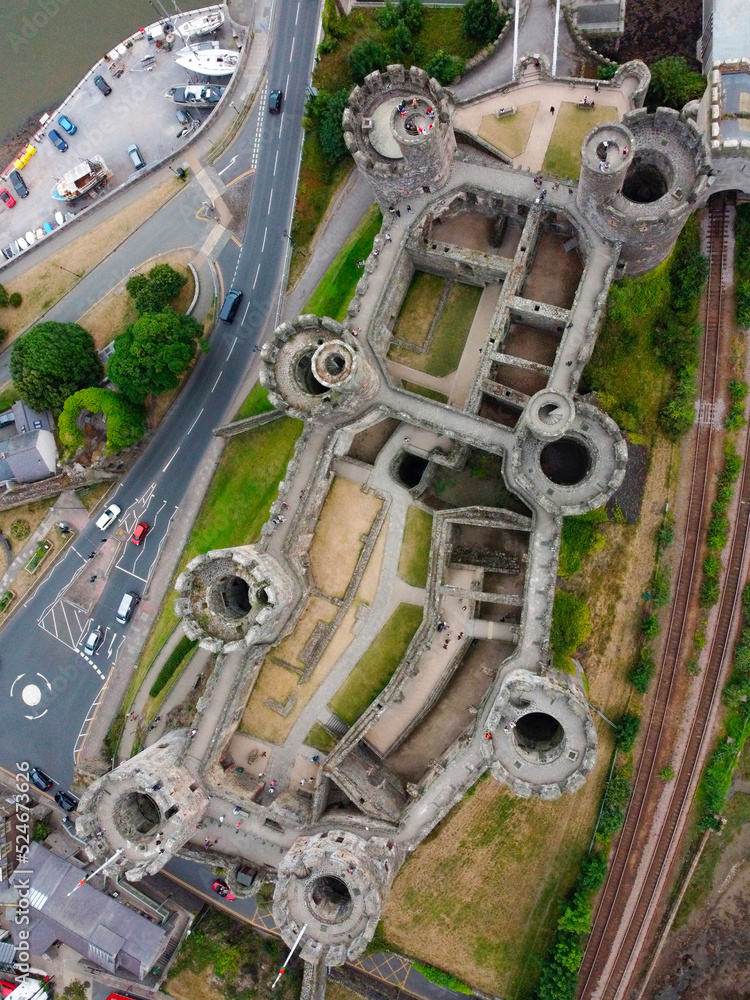 Aerial view of Conwy Castle in the town of Conwy in North Wales. It was ...