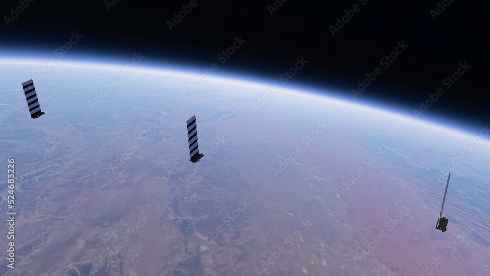 Fleet of Internet starlink satellites in orbit over earth. A line of ...