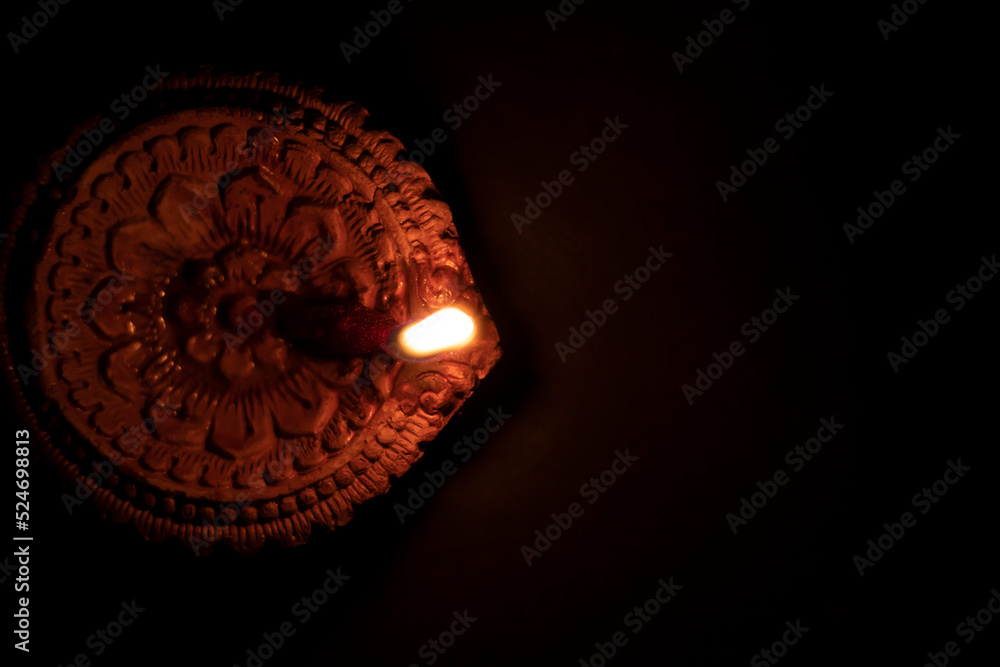 diwali diya Close up at night dark black background Stock Photo | Adobe ...