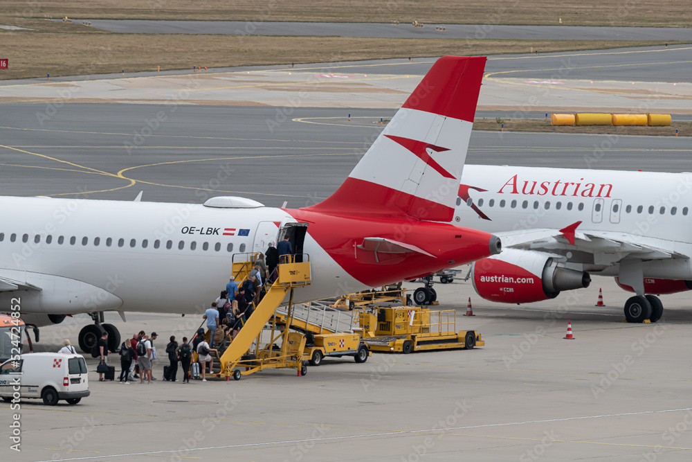 Austrian Airlines passenger plane at airport. Schedule flight travel ...