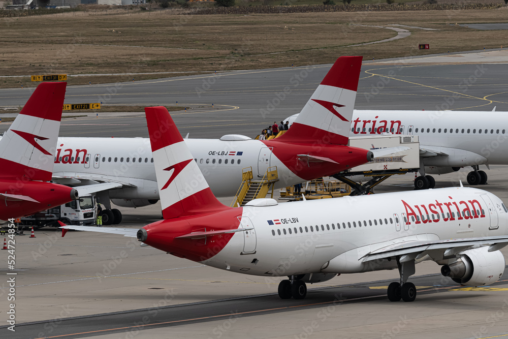 Austrian Airlines passenger plane at airport. Schedule flight travel ...
